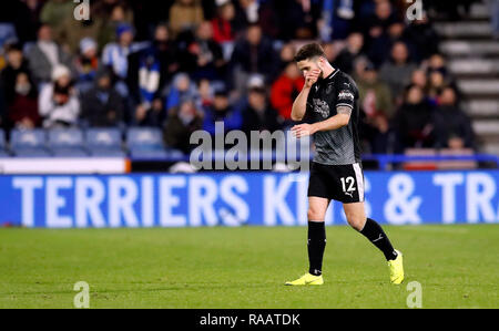 Burnley's Robbie Brady is shown a red card by referee Mike Dean during ...