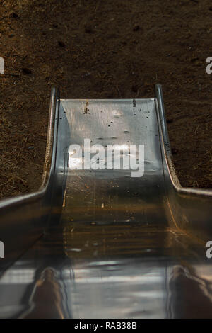 old slide playground traditional metal in school children countryside ...