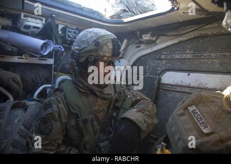 Camera gear sits, center, in a room during day 3 quarantine at a hotel ...