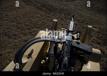 An M240B machine gun is mounted to a Common Remotely Operated Weapon ...