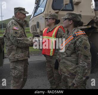 A Soldier from Company A, 700th Brigade Support Battalion, administers ...