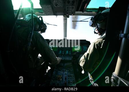 A 336th Tactical Fighter Squadron F-15E Eagle aircraft is readied for ...