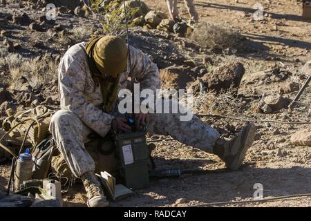 U.S. Marine Corps radio operators use communication gear during a mock ...