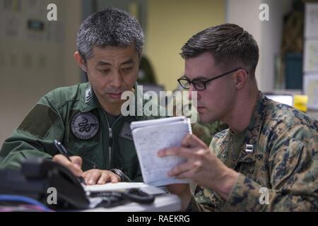 The 5TH Marine Expeditionary Brigade (MEB) color guard march on the ...