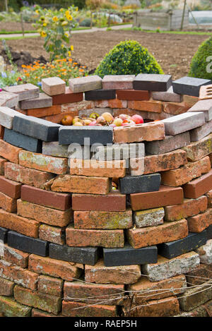 Makeshift brick built compost bin Stock Photo - Alamy
