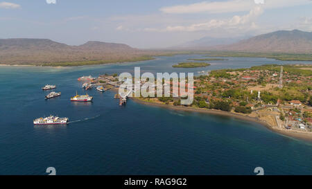 Aerial view ferry port gilimanuk with ferry boats, vehicles. Ferries ...