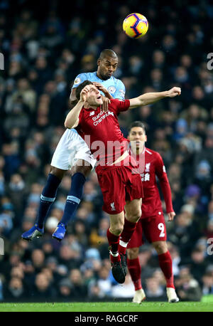 Liverpool's James Milner (left) and Manchester City's Bernardo Silva ...