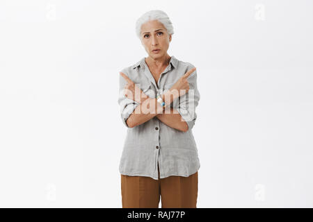 Portrait of white hair grandmother confused open mouth speechless when ...