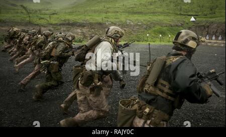 U.S. Marine Corps drill masters with Recruit Training Regiment lead a ...