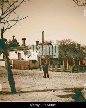 Mikweh. Boy and shy girl in front of building American Colony ...