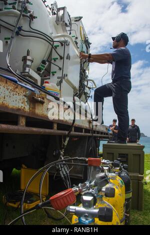 Royal New Zealand Navy Able Diver Hayden Shapcott, assigned to the ...