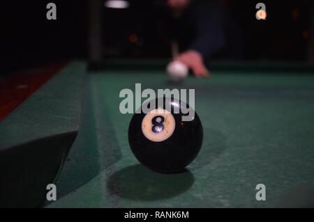 Game of pool, person playing pool and hitting balls Stock Photo - Alamy