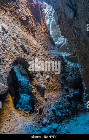Rocks, water and alluvial sand in a small mountain valley formed by ...