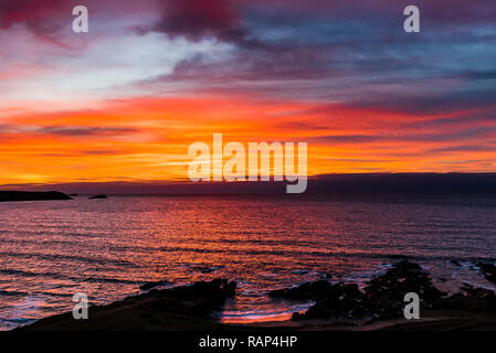 Red skies at sunset over Fistral Beach, Newquay, Cornwall, UK Stock ...