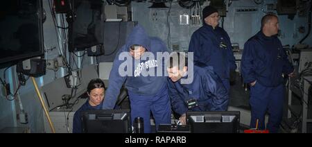 U.S. Marines and Sailors examine the new Landing Craft, Air Cushion ...