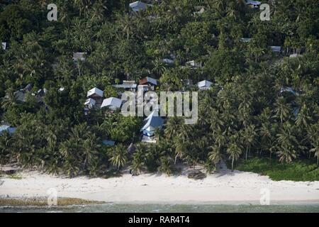 A village on Fais Island, Federated States of Micronesia, anticipates ...