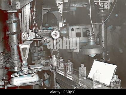 bottles moving along conveyor belt line Dannon spring water bottling ...