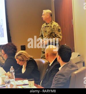 A U.S. Navy commander briefs liaison officers on the legal procedures ...