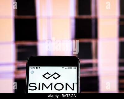 Simon Property Group Real estate company logo seen displayed on smart ...