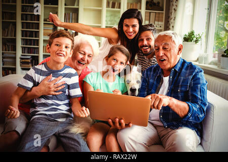 portrait of happy grandmother and daughter using laptop Stock Photo - Alamy