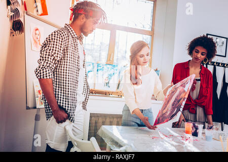 Handsome man wearing make up and woman clothes cheerful with a smile on ...