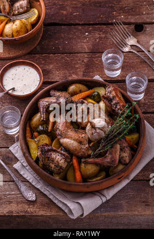 Oven roasted rabbit leg Stock Photo - Alamy