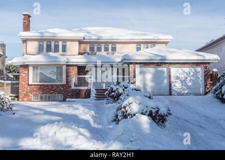 Big residential house in snow on winter season in Canada Stock Photo ...
