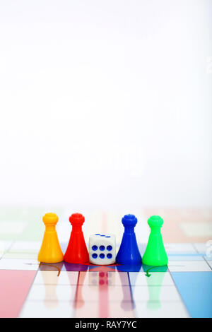Picture of colorful pawns with dice Stock Photo - Alamy