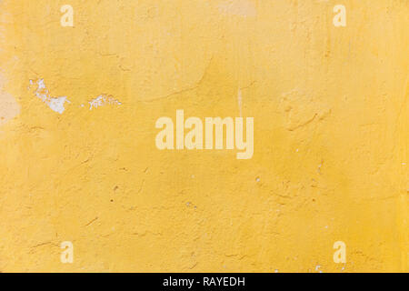 Yellow old faded wall texture background Stock Photo - Alamy