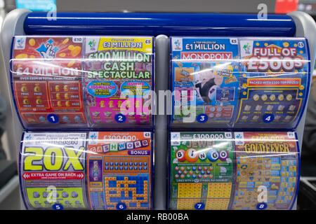 National lottery scratch cards on sale in a supermarket shop in the UK ...