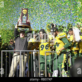 North Dakota players celebrate winning a NCAA women's basketball game ...