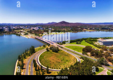 Commonwealth Bridge over Lake Burley Griffin in Australia capital city Canberra. Australian ...