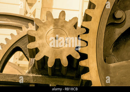 teeth of big cog wheels merge together Stock Photo - Alamy