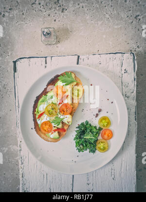 Flat lay composition with tasty toasted bread on table Stock Photo - Alamy