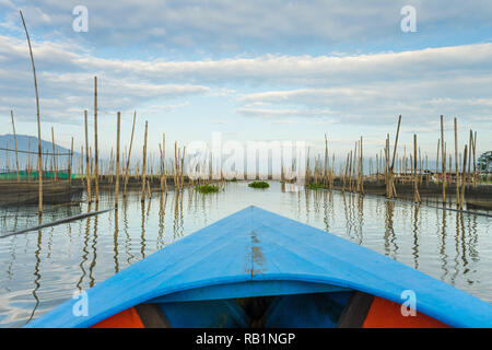 Passing Rawa Pening Lake with a boat Stock Photo - Alamy