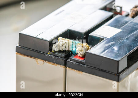 Old battery corrosion, seal lead acid battery damage Stock Photo - Alamy