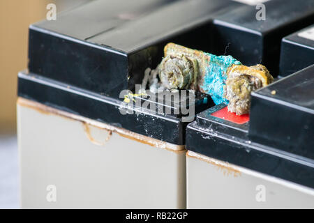 Old battery corrosion, seal lead acid battery damage Stock Photo - Alamy