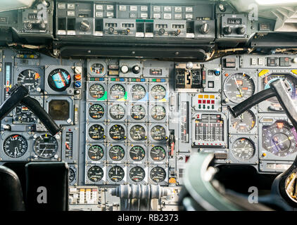 Flight instruments on an instrument panel in a cockpit of Boeing 777 ...