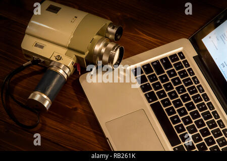 Contrast between different periods of technology: a vintage Super 8 ...