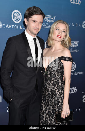 Ashley Grace and Topher Grace attend The Art Of Elysium's 2025 HEAVEN ...