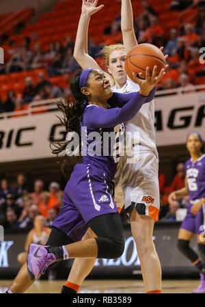 TCU guard Lauren Heard (20) battles Cornell guard Shannon Mulroy (22 ...