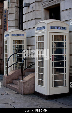 White telephone boxes of the Kingston upon Hull Telephone company Stock ...