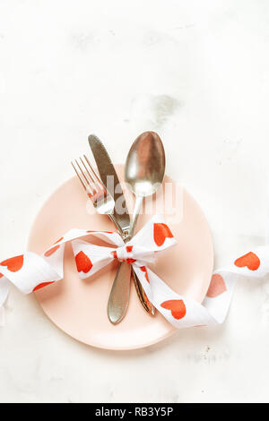 Festive table setting for Valentine's Day dinner with beautiful flowers ...
