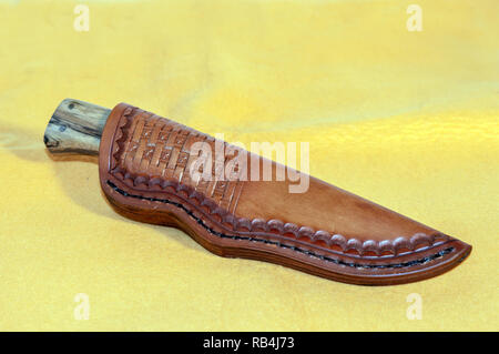 Knife with a sheath Stock Photo - Alamy