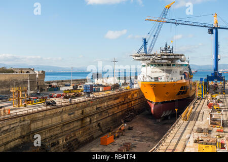 Gibraltar rock. Dry dock, dry dock with cranes, British overseas ...