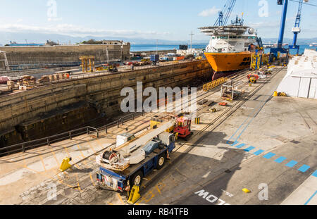 Gibraltar rock. Dry dock. SBM installer Vessel, support vessel being ...