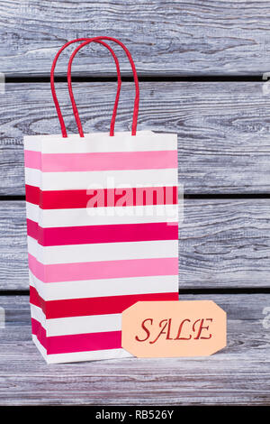 brown shopping bag with red handles isolated on white background Stock ...