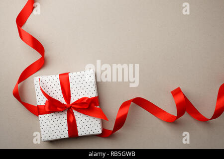 Valentine day composition: red gift box with bow and heart. Christmas ...