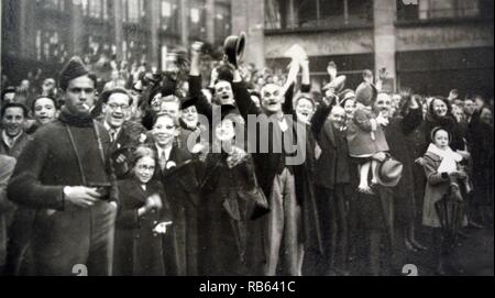 French crowds cheer American liberators in a town in Alsace Lorraine ...