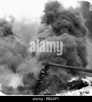 Photograph of an oil well on fire in the Kirkuk district, Iraq, showing ...